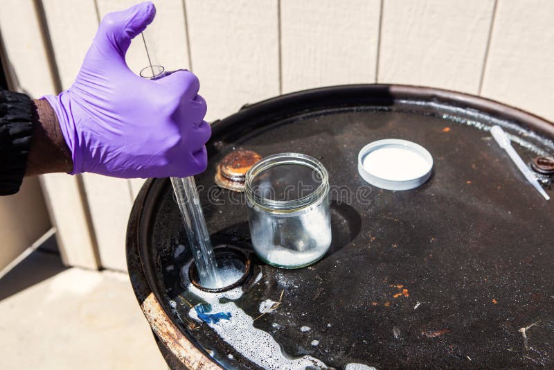 Person Sampling with Coliwasa Sampling Device Stock Image - Image of ...