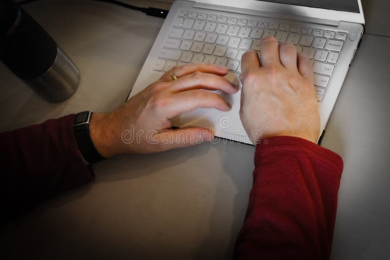 A Person Scrolling and Typing on a Notebook Computer Laptop Keyboard ...