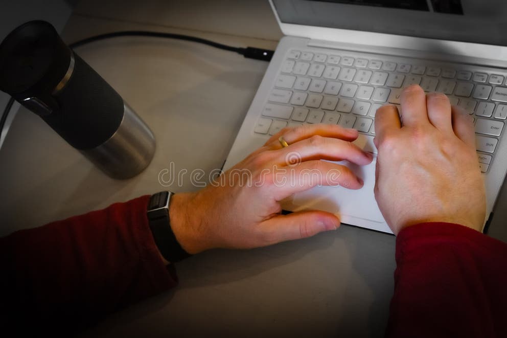 A Person Scrolling and Typing on a Notebook Computer Laptop Keyboard ...