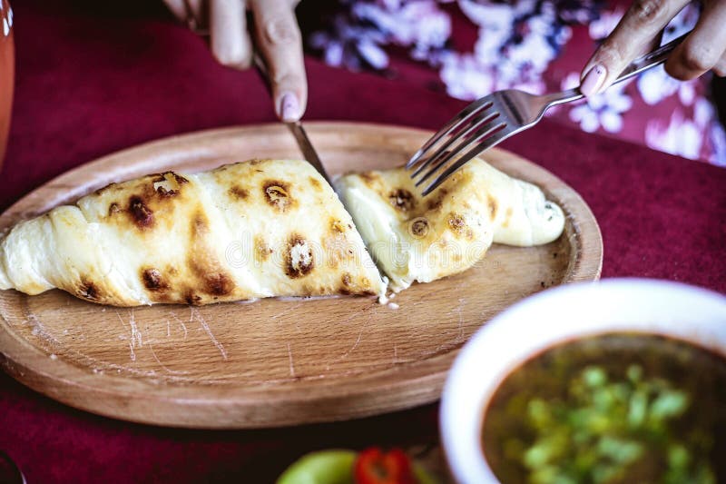 Person Cutting Food with Knife and Fork Stock Image - Image of slice ...