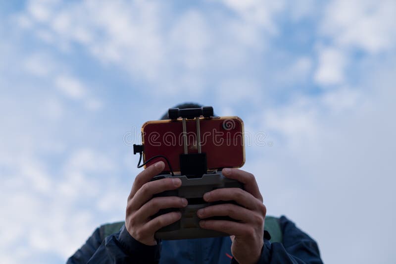 Low Angle View of Person Using Drone Remote Control Stock Image - Image ...
