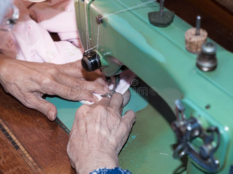 Person sewing machine stock image. Image of factory, adult - 48578195