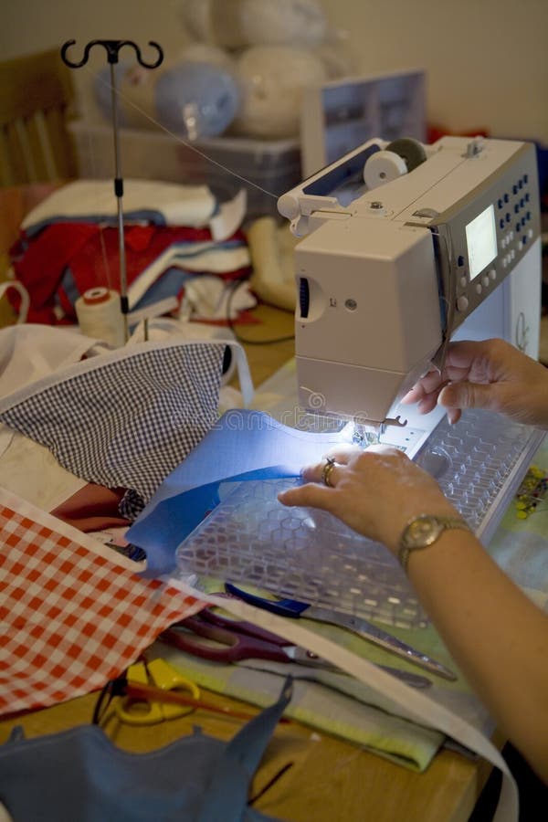 Person on Sewing Machine Making Bunting Stock Image - Image of olympics ...