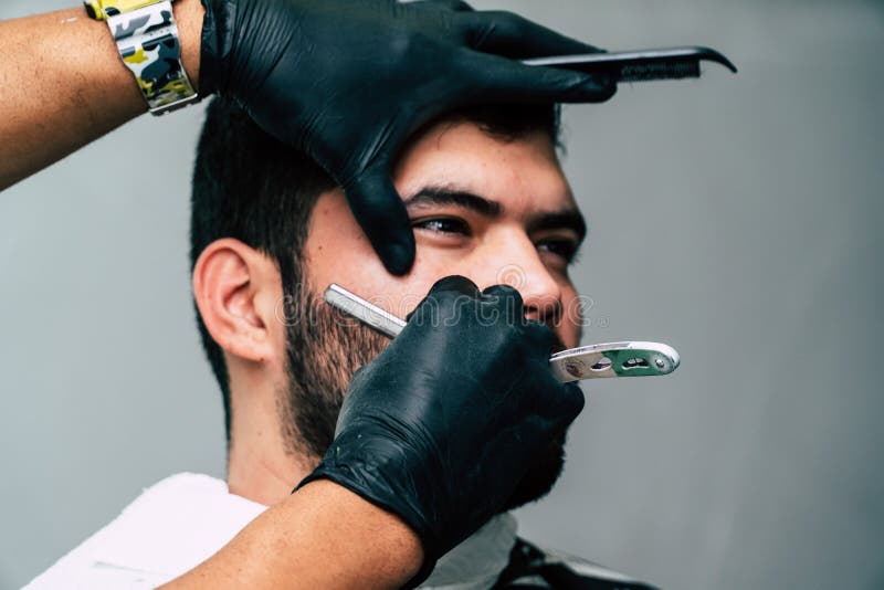 Person Shaving A Man's Face With Straight Razor Picture. Image: 111169924