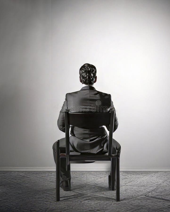 Person Sitting Alone on a Chair with in an Empty Room at Background ...