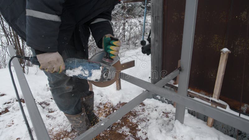 Winter Metal Work Includes Tasks Like Cutting Frames Under Snowy ...
