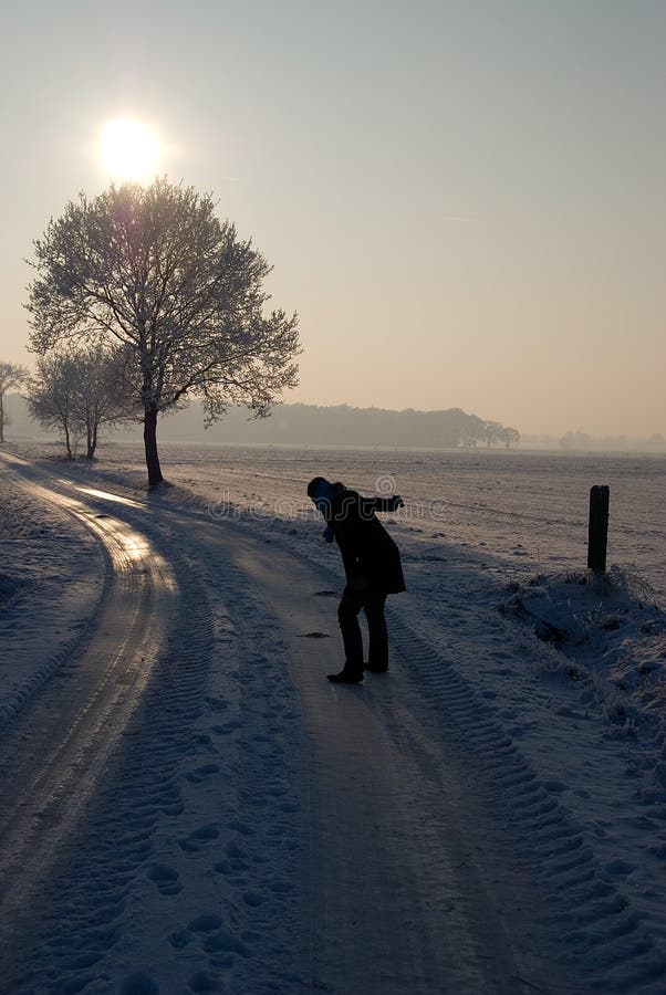 Person Slipping on Icy Road Stock Photo - Image of frozen, rural: 7712806