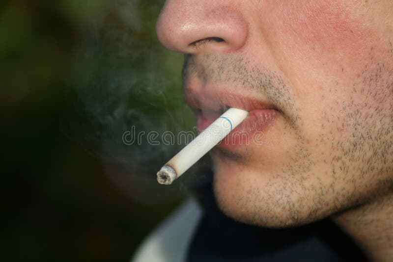 Person Smoking a Cigarette stock image. Image of closeup - 13817269