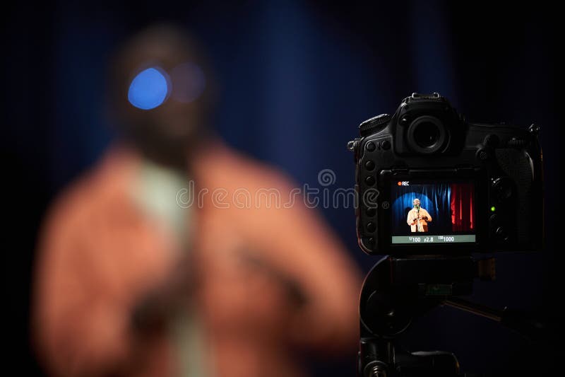 Recording Person on Stage with Camera Equipment Stock Photo - Image of ...