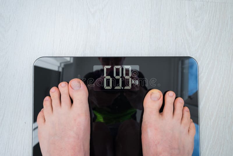 Person Standing on Weighing Scale Stock Image - Image of fitness ...
