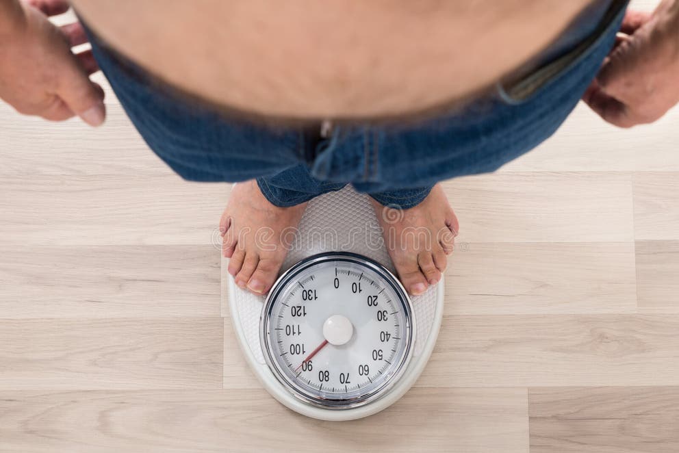 Person Standing on Weighing Scale Stock Image - Image of device ...