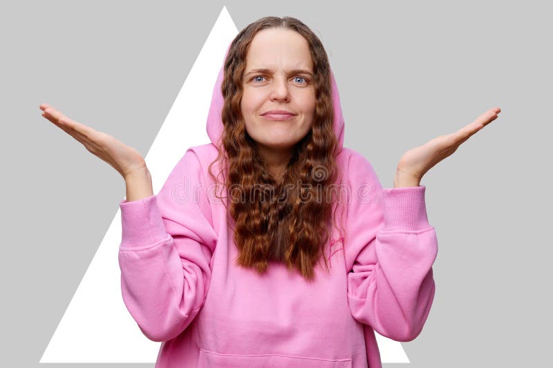 A Person Stands with a Slightly Puzzled Expression, Displaying Open ...