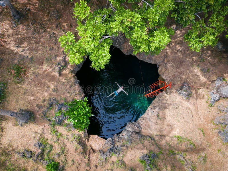 Person Swimming in a Cabagnow Cave Pool, Anda, Philippines Stock Photo ...