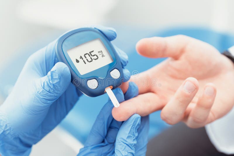 Person is Taking a Blood Sugar Reading Stock Photo - Image of meter ...