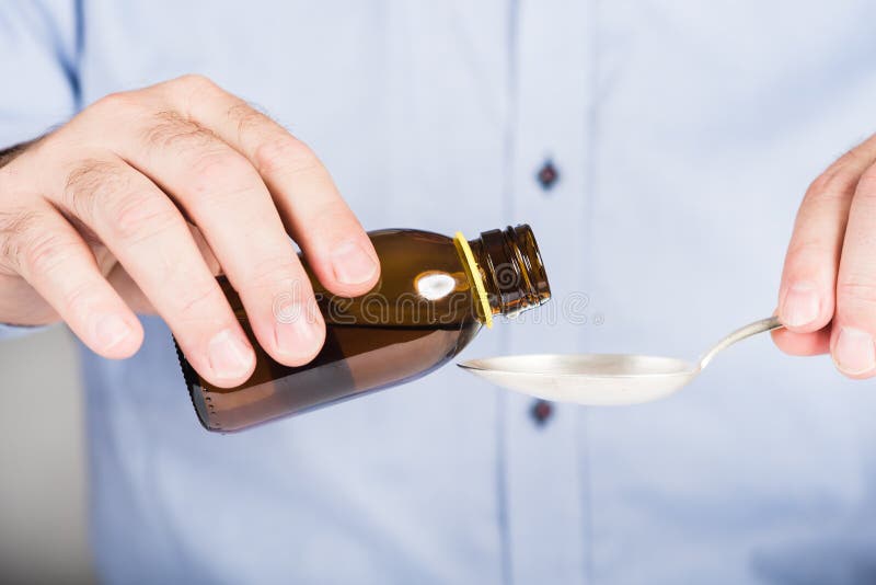 The Person Taking Cough Syrup. Stock Image - Image of disease, center ...