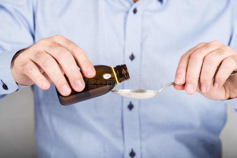 The Person Taking Cough Syrup. Stock Image - Image of dose, bitter ...