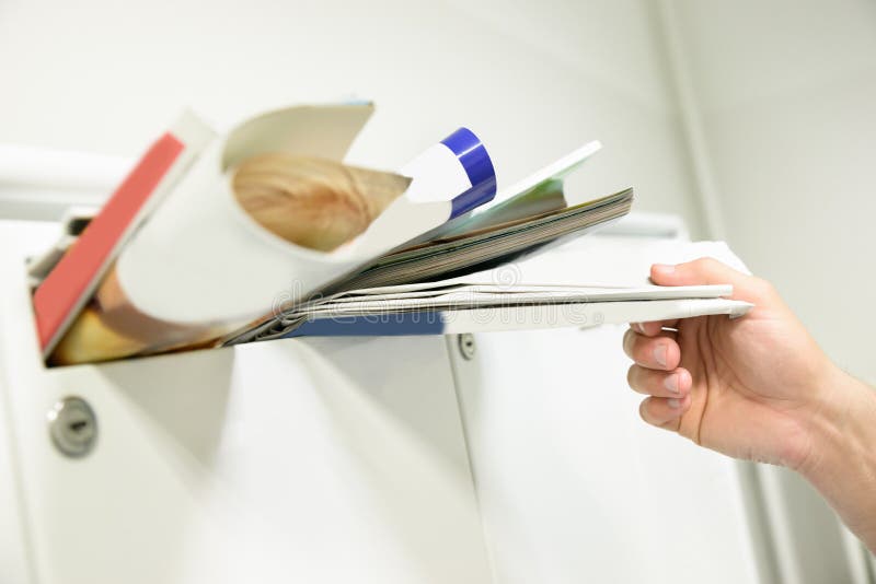 Person Taking Documents from Mailbox Stock Photo - Image of envelope ...