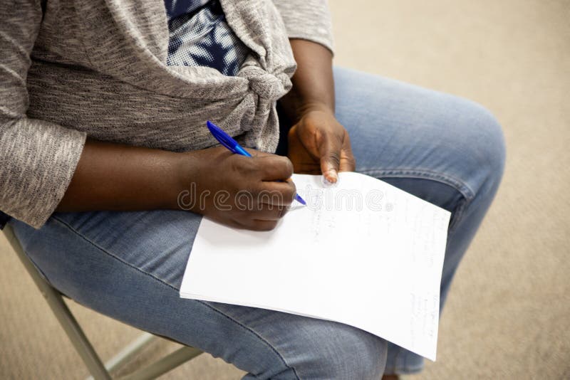 Person Taking Notes during First Aid Training Stock Image - Image of ...