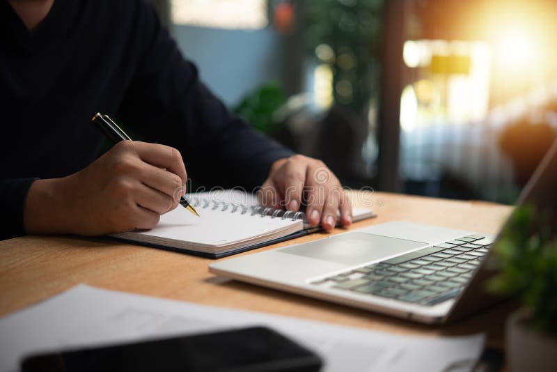 Person Taking Notes with Pen on Notebook, Planning, Organization, or ...