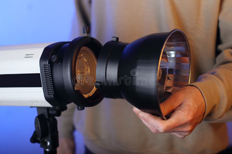 Person Taking Off Flash Shade Stock Photo - Image of tripod, person ...