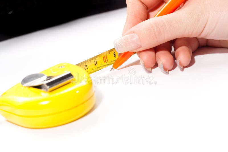 Person with tape measure stock photo. Image of design - 13097454