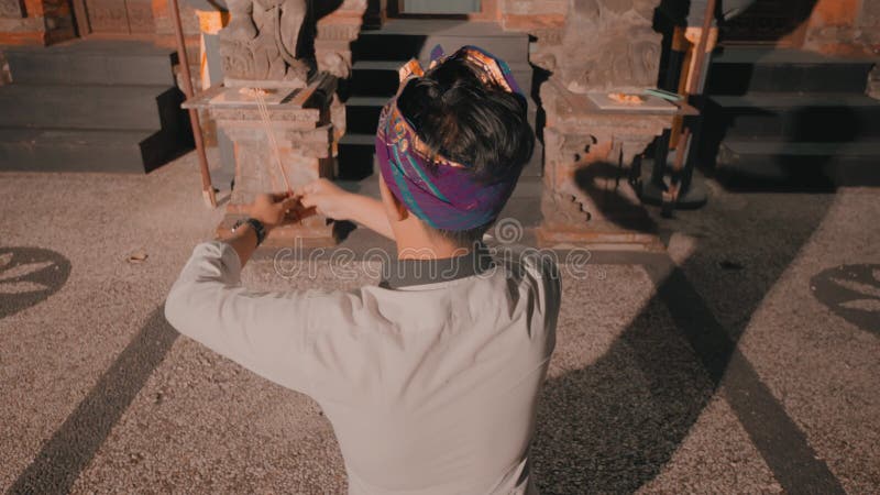 Person Performing Ritual in Traditional Attire at Temple Stock Footage ...