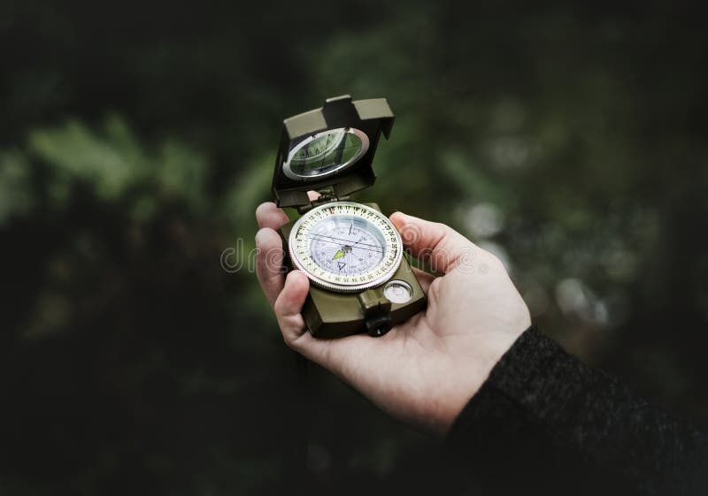 Person Trekking in a Forest Using Compass Stock Image - Image of jungle ...
