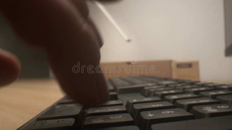 Person Types on Computer Keyboard Against Cardboard Boxes Stock Video ...