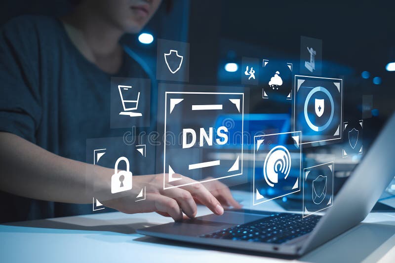 Person Using Laptop Surrounded by Digital Dns Symbols and Security Icons in Futuristic Setting ...