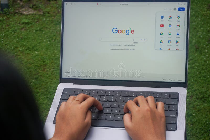Person Typing Laptop Keyboard Using Google Search Engine Stock Photos ...