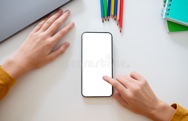 Person Using Blank Smartphone Flat Lay Next To Laptop Stock Image ...
