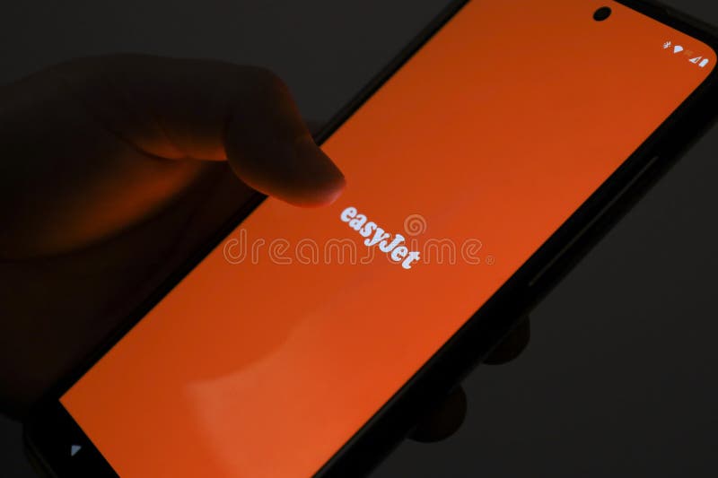 Person Using Easyjet Flight Booking Application on Mobile Phone ...