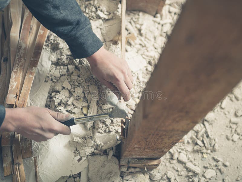 Person Using Hammer in Rubble Stock Photo - Image of person, house ...