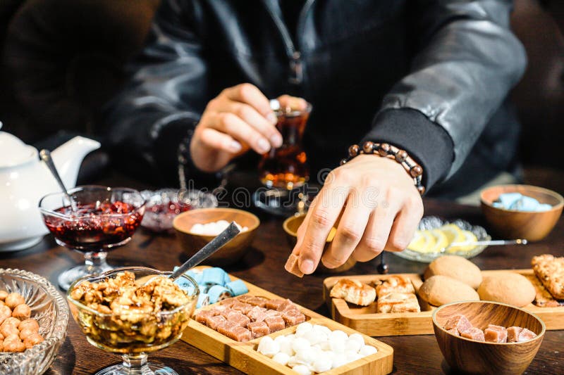 Person Cutting a Piece of Food at a Table Stock Image - Image of lunch ...