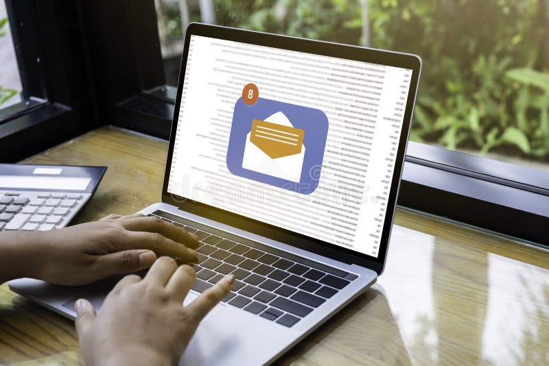 Person Using a Laptop Computer with Email Communication Connection ...