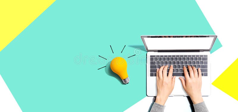 Person Using a Laptop Computer and a Light Bulb Stock Image - Image of ...