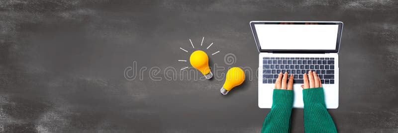 Person Using a Laptop Computer and Light Bulbs Stock Image - Image of ...