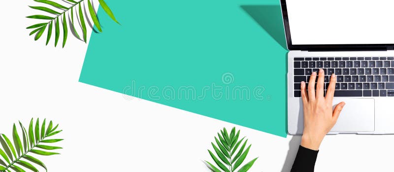 Person Using a Laptop Computer with Tropical Leaves Stock Photo - Image ...
