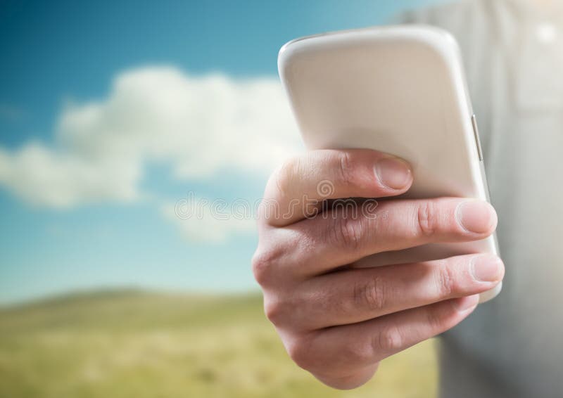 A Person Using a Mobile Phone Stock Photo - Image of friends, outside ...