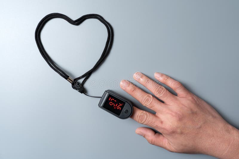 Person Using Pulse Oximeter Device Stock Photo - Image of heart ...