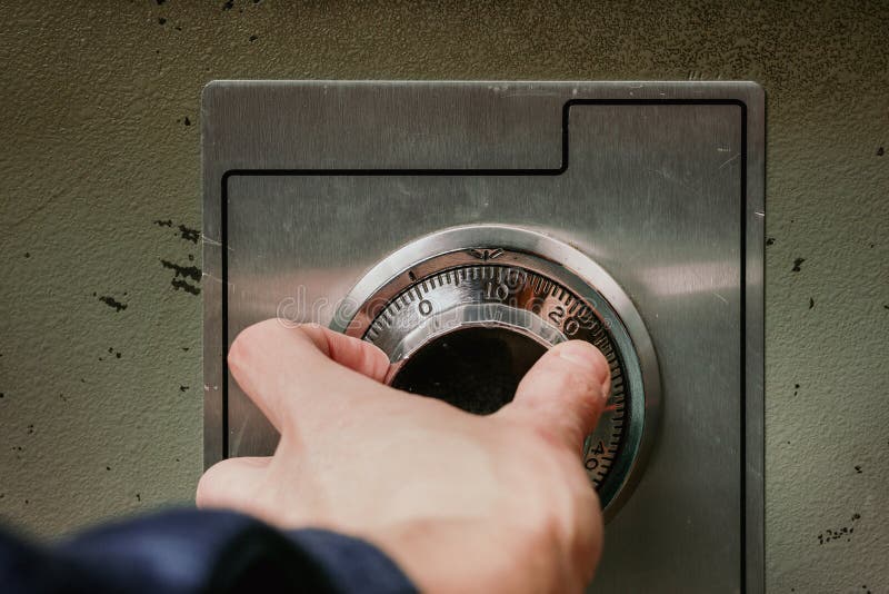 Person Using Security Safe with Mechanical Combination Lock or Dial ...