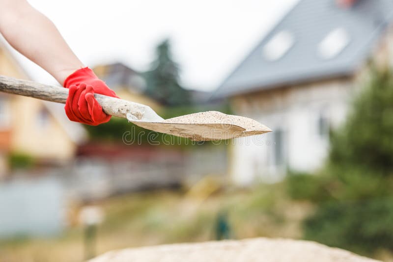 Person Using Shovel on Construction Site Stock Image - Image of ...