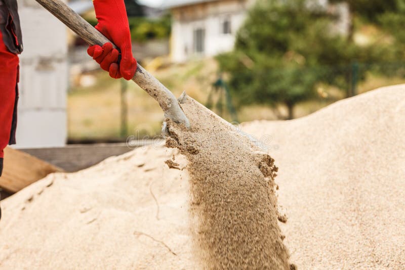 Person Using Shovel on Construction Site Stock Image - Image of ...