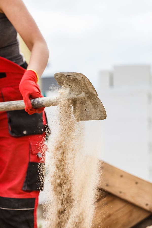 Person Using Shovel on Construction Site Stock Photo - Image of sand ...