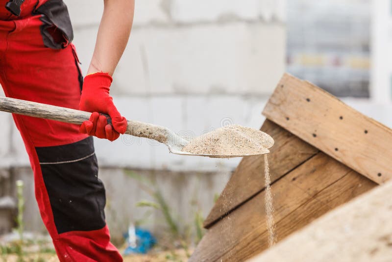 Person Using Shovel on Construction Site Stock Photo - Image of work ...