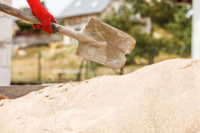 Person Using Shovel on Construction Site Stock Photo - Image of ...