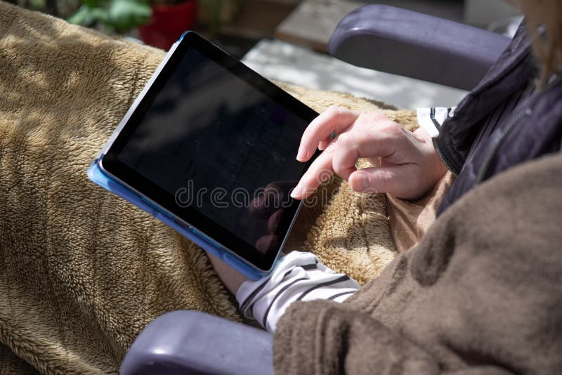 Person using tablet stock photo. Image of media, people - 179826368