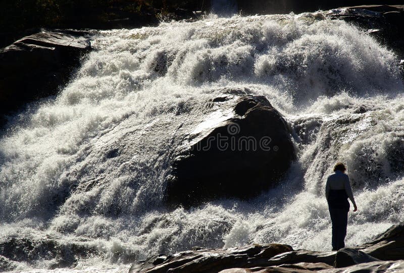 Person at waterfall stock image. Image of flow, thunderous - 1367077