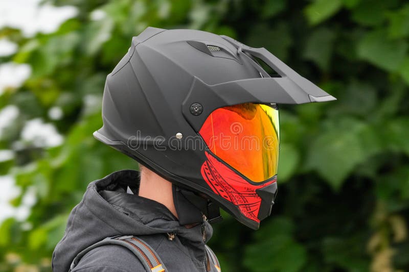A Person Wearing a Black Helmet with Red Goggles Stock Photo - Image of ...