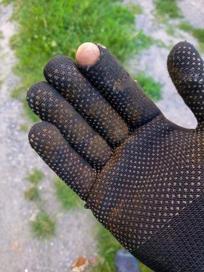 A Person Wearing a Pair of Black Gloves on Their Hand Stock Image ...